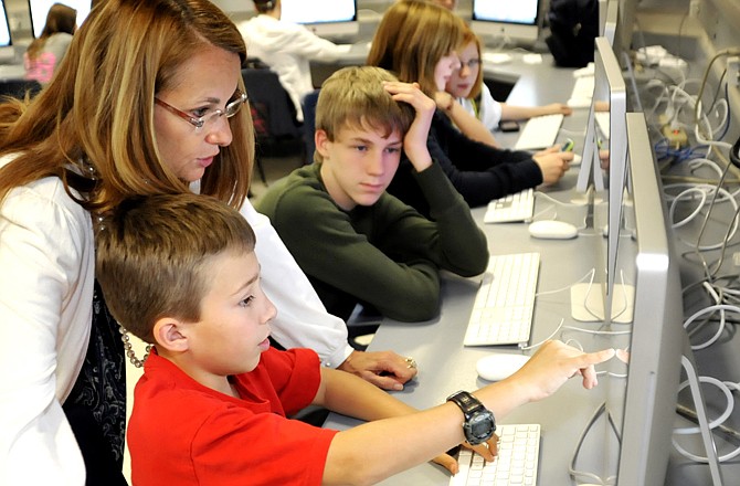 Web of friendship: TJMS French Club students link up with middle ...