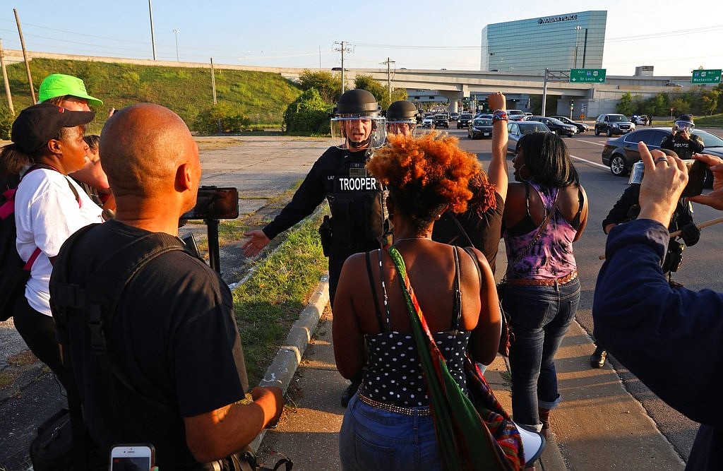Protesters march in St. Louis suburb over police shooting | Jefferson ...