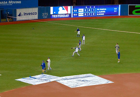 Blue Jays-Royals off because of falling ice, hole in roof | Fulton Sun