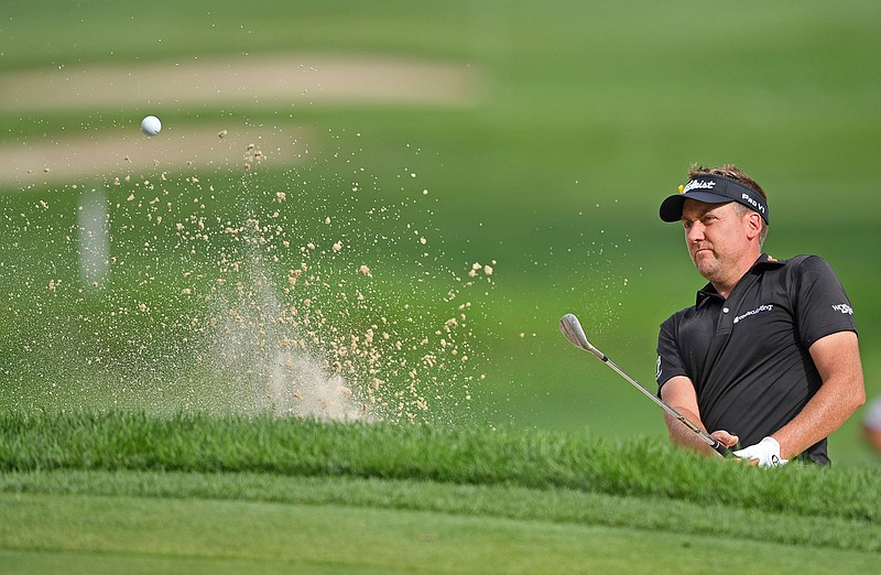 Poulter leads at 62, with Woods 4 behind at Firestone | Texarkana Gazette