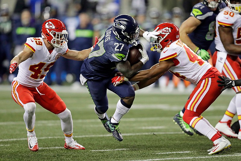 Seahawks outduel Chiefs to fight their way back to the playoffs ...