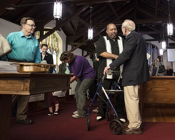 Community prayer service offers comfort, support in tornado's wake ...