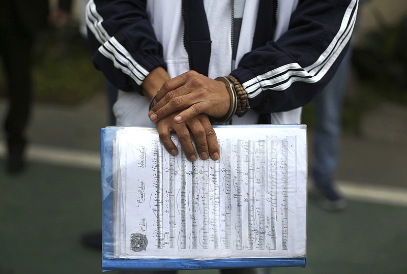 Peru rehabilitates inmates with music | Fulton Sun