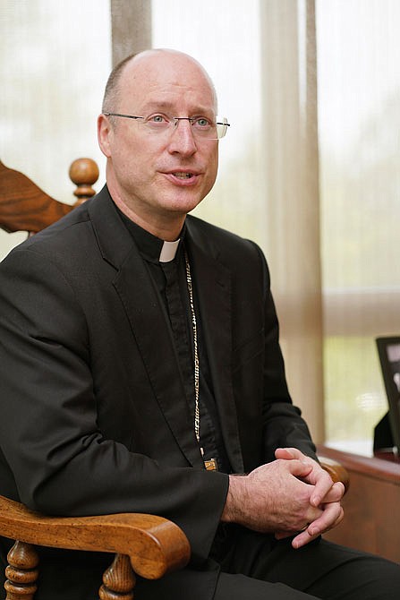 Jefferson City Bishop McKnight looks outside the church for like-minded ...