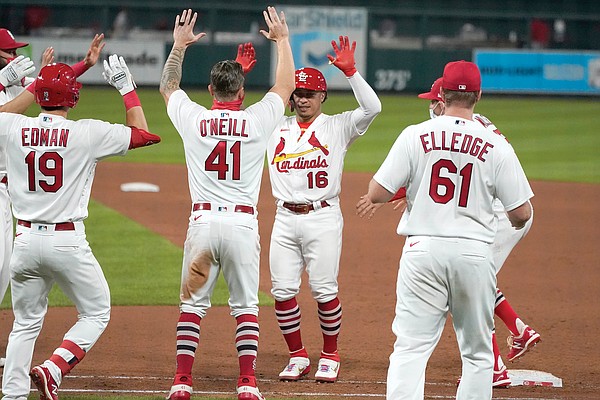 Cards finally back home, rally for three in 9th to beat Reds ...