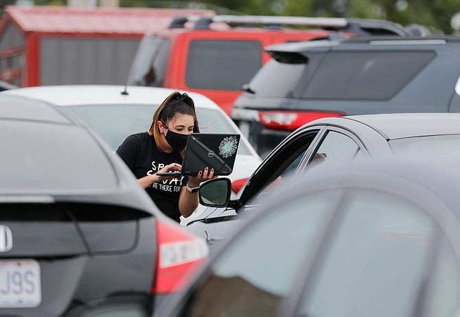 schools-adapt-pickup-drop-off-procedures-to-prevent-virus-spread