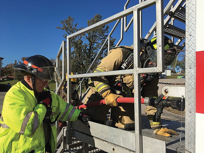 Firefighter students run through structure fire simulation | Jefferson ...