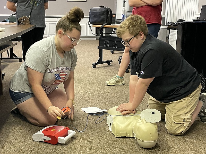 Youth work on earning CPR certification | Fulton Sun