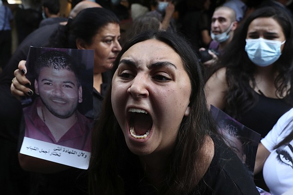 Families of Lebanese blast victims protest interior minister ...