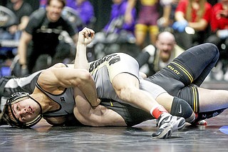 Purdue’s Ramos shocks Iowa’s Lee; Penn State leads team race ...