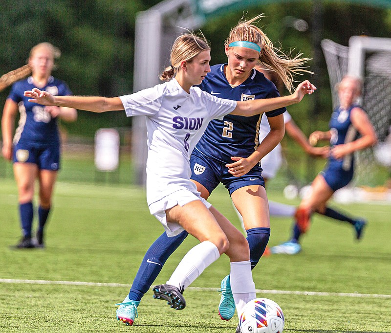 Notre Dame de Sion scores two quick goals to get past Helias in title ...