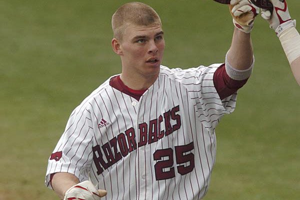 Kuhn can hit, gets hit, too | Whole Hog Sports
