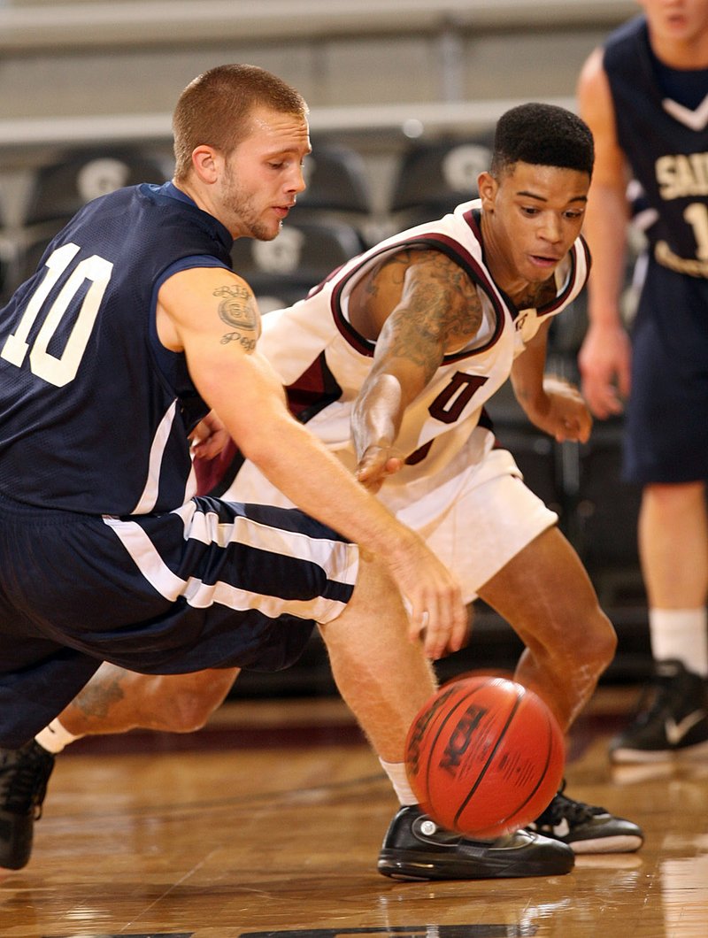 Williams, Guy run point for Trojans | Northwest Arkansas Democrat-Gazette