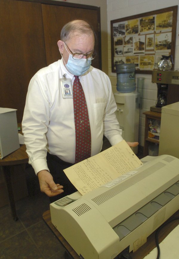 Archivist Melds Past, Present