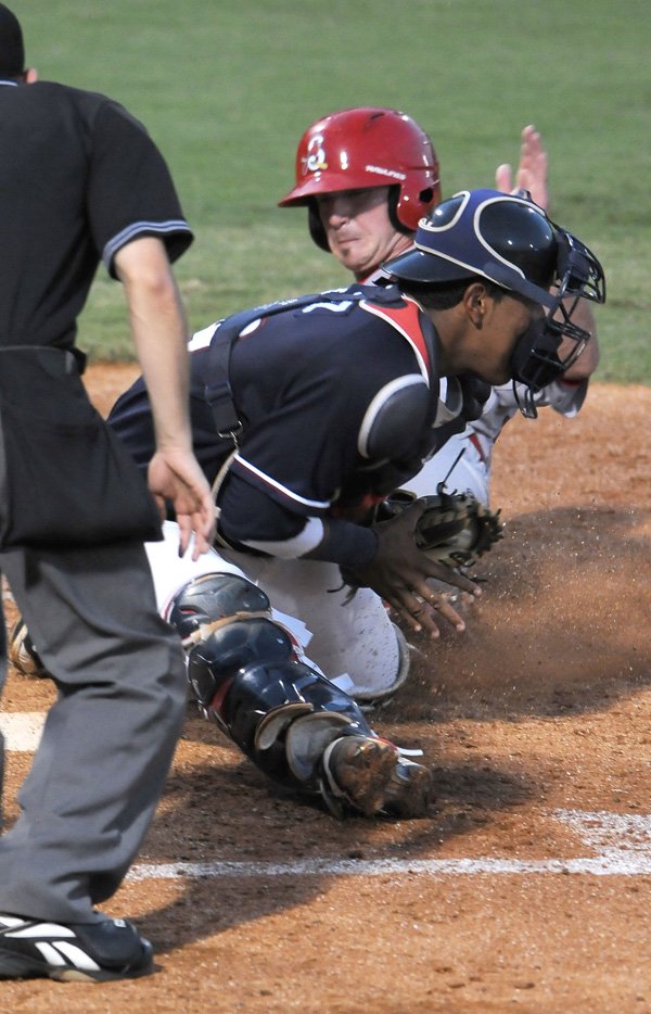 Naturals Edge Out Cardinals