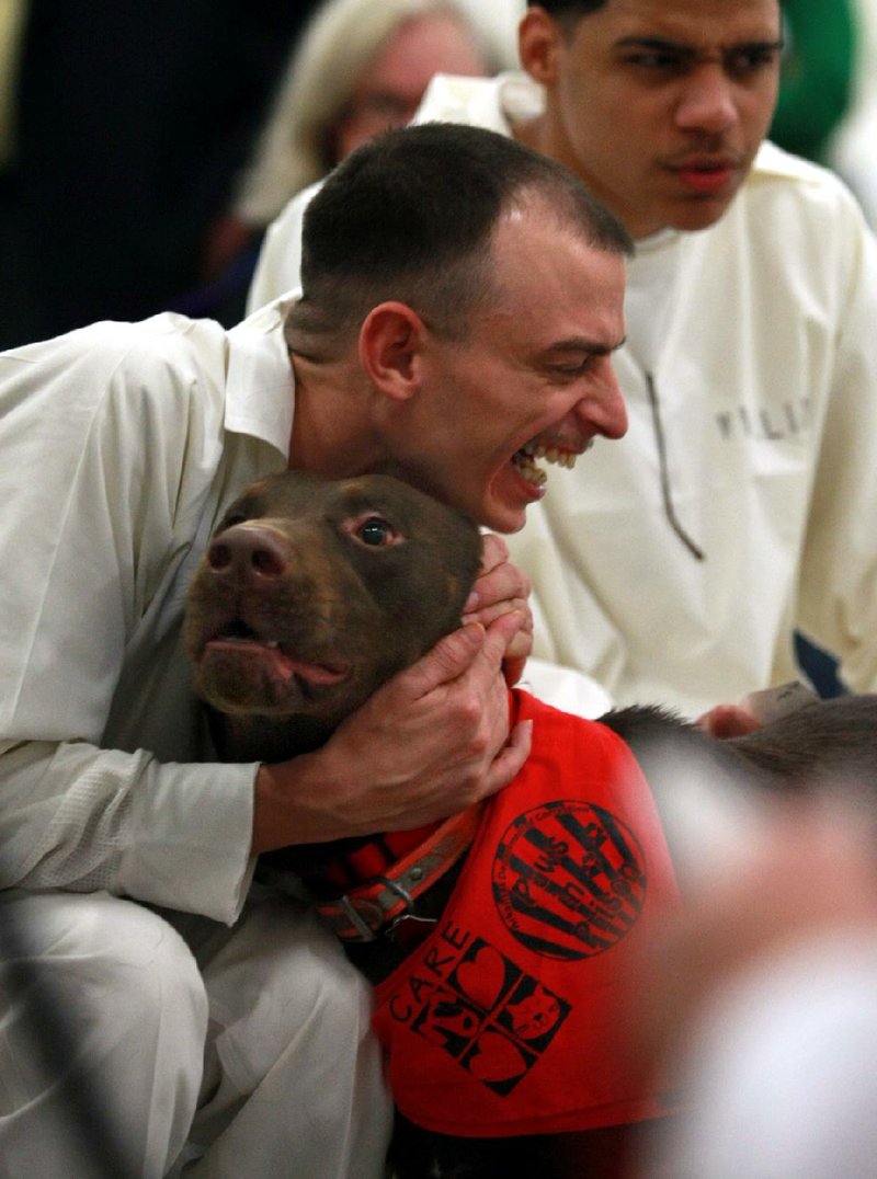Prison program affords inmates, pooches new leashes on life | Northwest ...