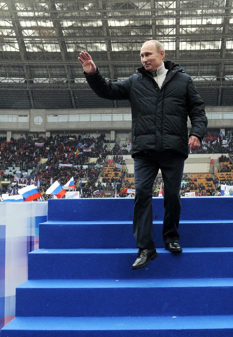 At campaign rally, Putin vows victory against foes | The Arkansas ...