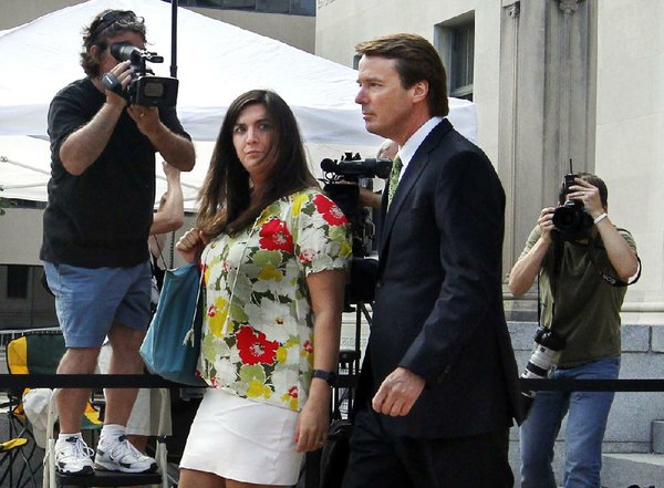 Edwards’ daughter flees court in tears