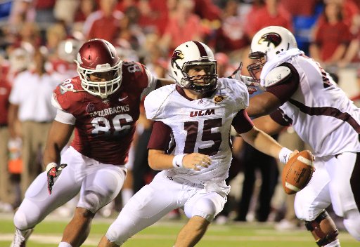 WholeHogSports - Hogs stunned in overtime