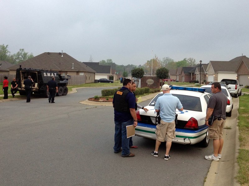 Man in attic surrenders after SWAT team responds Man in attic surrenders after SWAT team responds