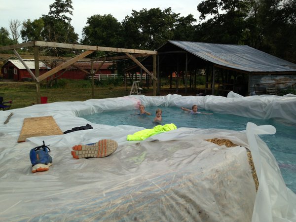 PHOTOS: Gravette man's hay-bale pool an Internet hit