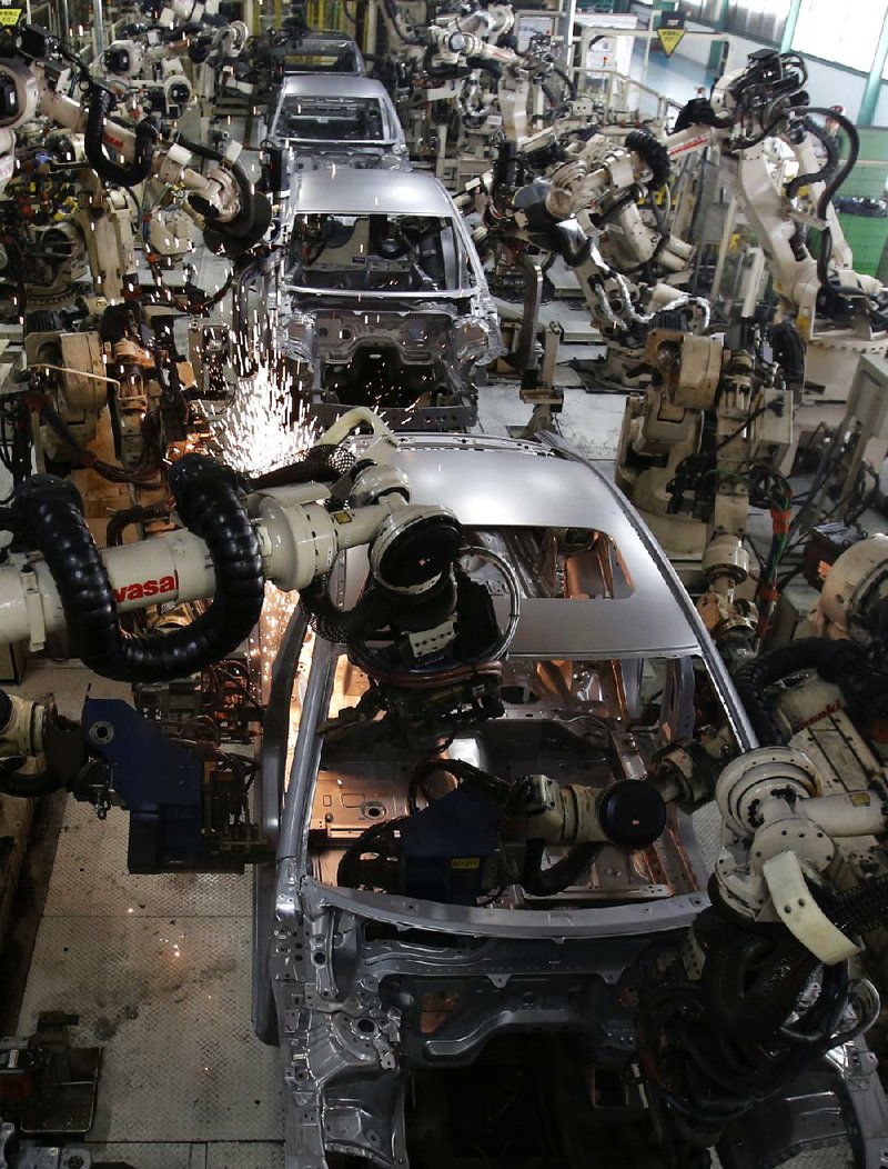 On roll now, Mazda turning out cars fast at revamped factory ...