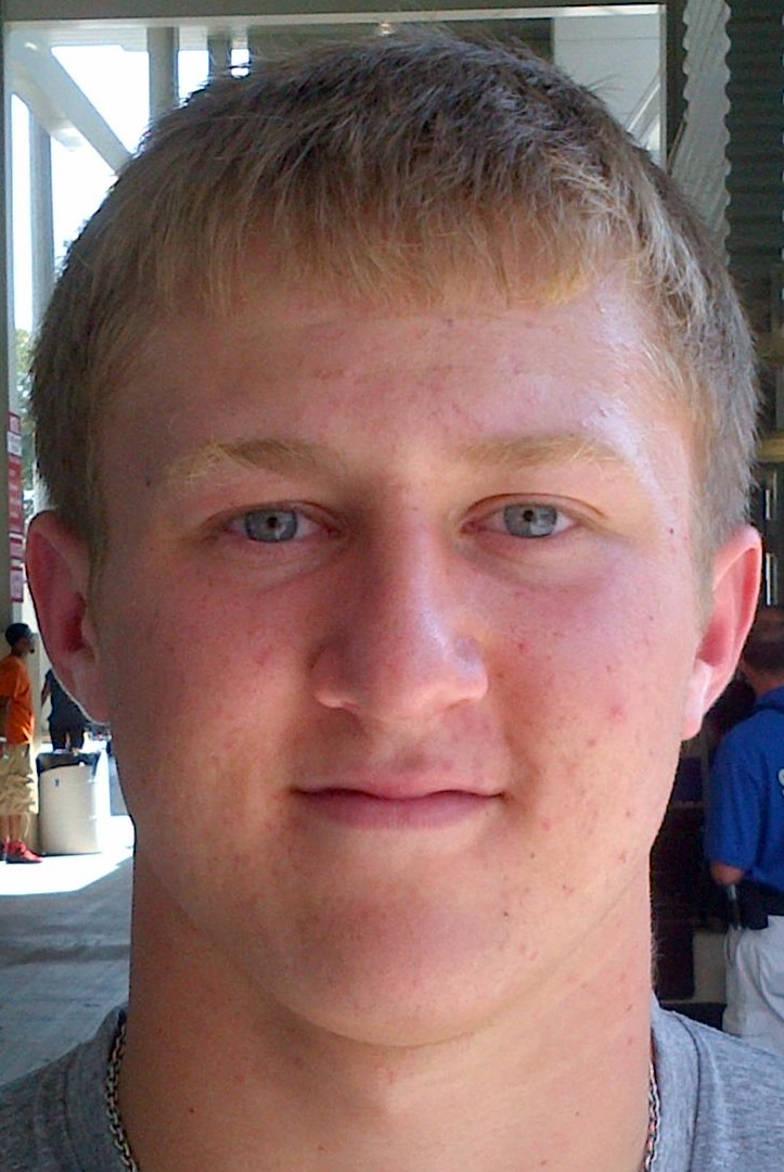 WholeHogSports - Hogs looking at two Highland playmakers