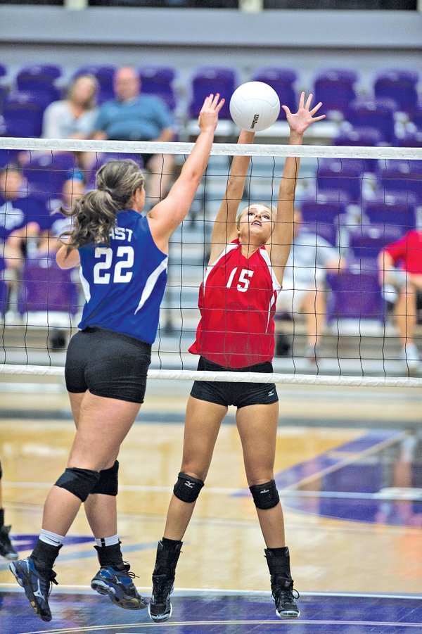 East Dominates West In Volleyball