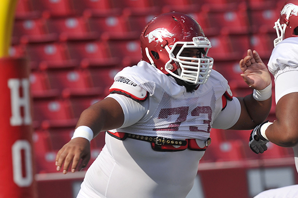 WholeHogSports - Less will lead to more for Hogs lineman