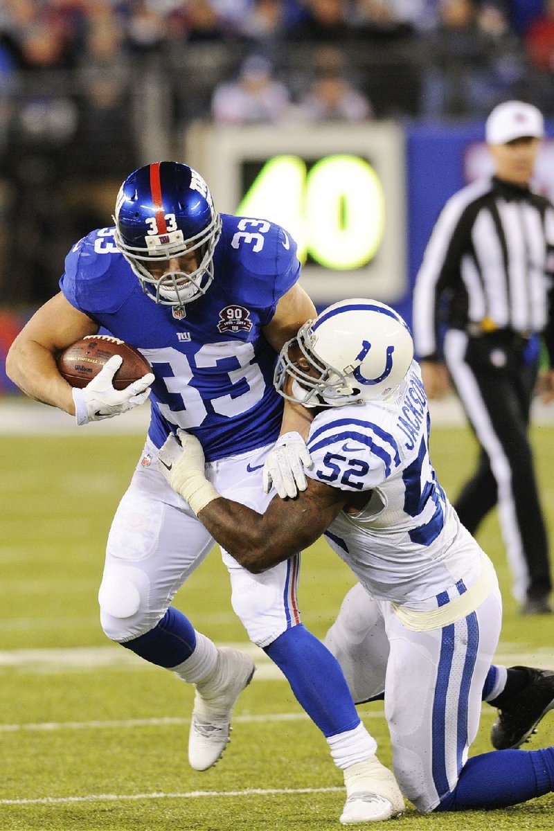 Colts roll with Luck's 4 TD passes | Northwest Arkansas Democrat-Gazette