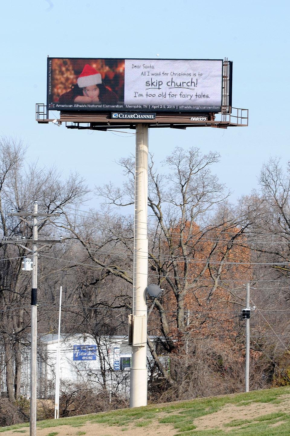 Atheists, church vie on billboard