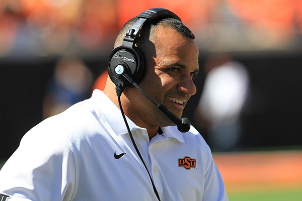 Singleton hired to coach UA running backs