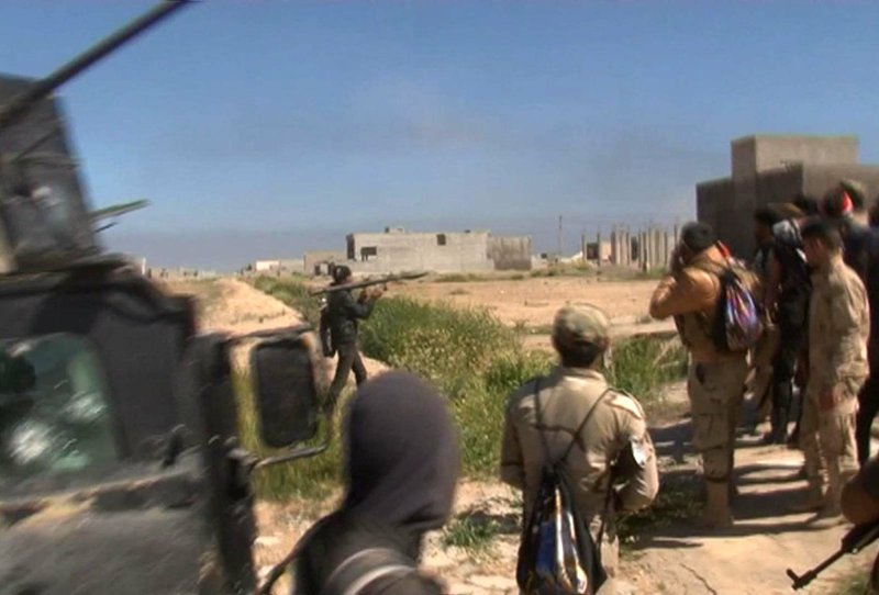 Iraqi forces, militias sweep into Islamic State-held Tikrit | El Dorado ...