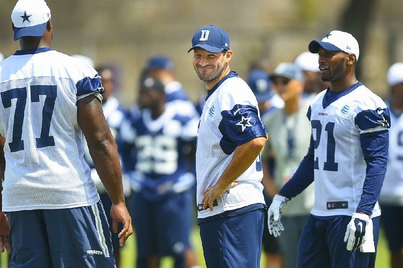Bad back holds up for Romo | The Arkansas Democrat-Gazette - Arkansas ...