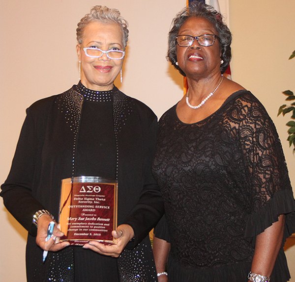 Three are honored at annual DST dinner
