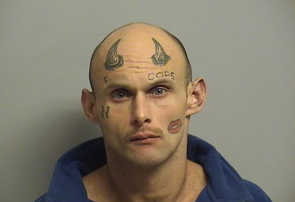 MUG SHOT: Man with horns, obscene forehead tattoos arrested