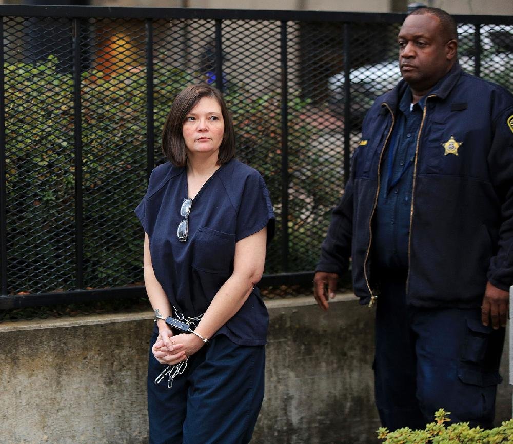 Police worked on hands, knees to uncover body