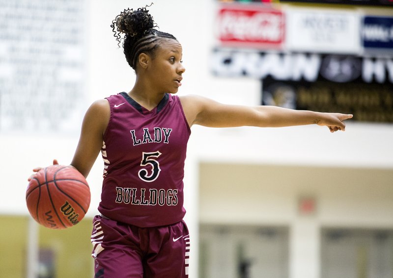 Basketball: Lang stronger than ever, leading Springdale