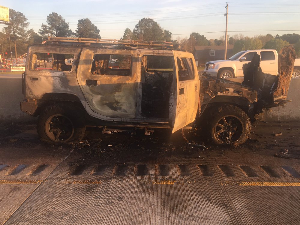 WATCH: Bryant officers save man from burning Hummer