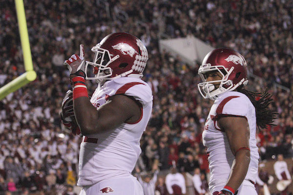 WholeHogSports - Hogs run roughshod, then pick 'em apart