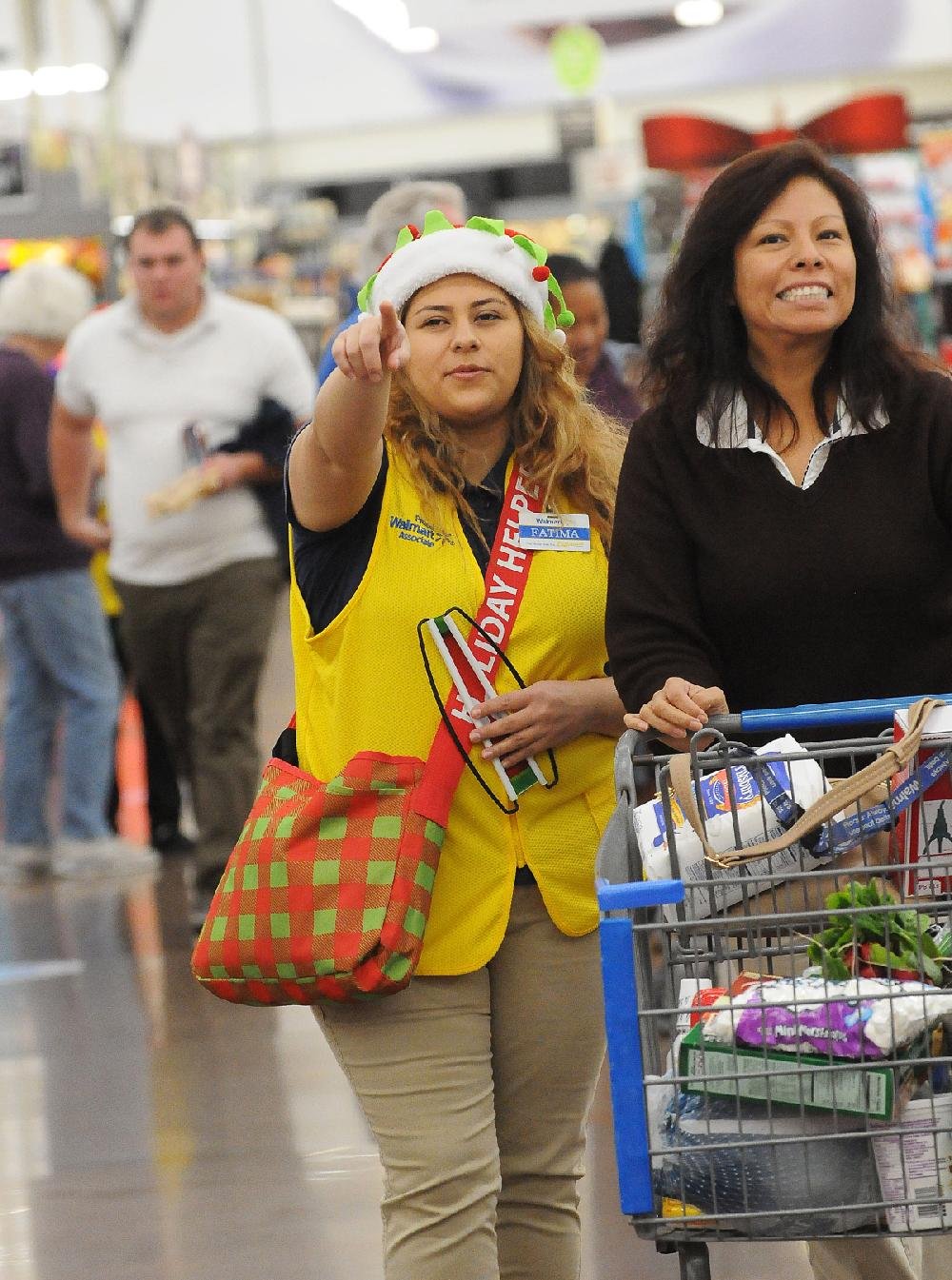 Wal-Mart using holiday helpers