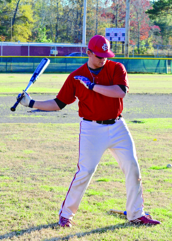 Working on his swing