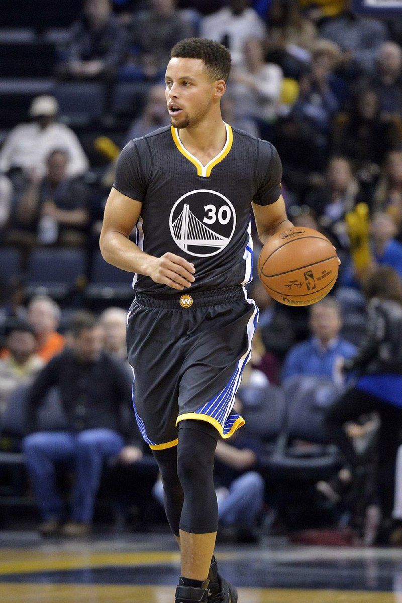 Superstars Curry, Durant thriving as new teammates