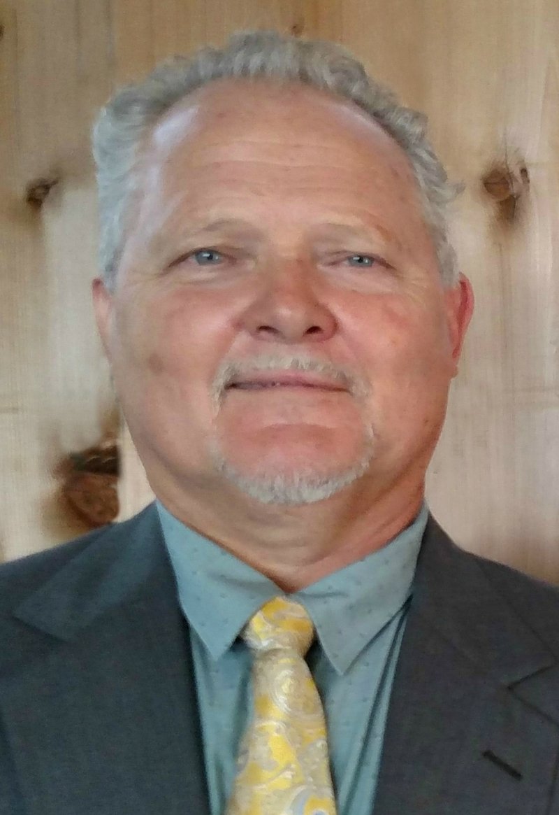 KENNETH L. RAINS