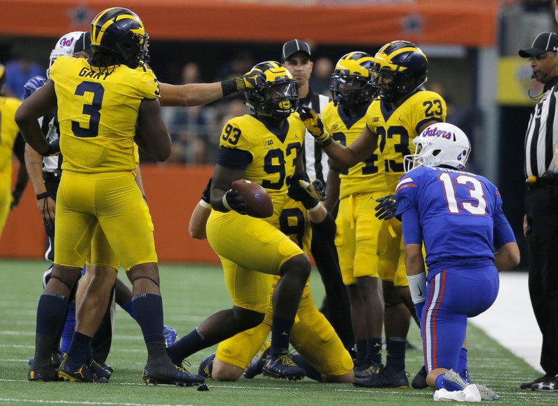 Michigan rolls late, tops No. 17 Florida