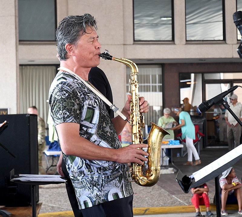 Music in the streets: Performers at festivals share ties to Spa City ...