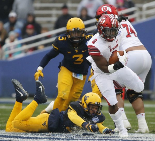 Moss, Utah run past West Virginia in Heart of Dallas | Hot Springs ...
