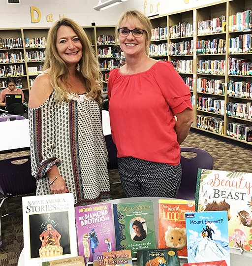 Scenic 7 donates books