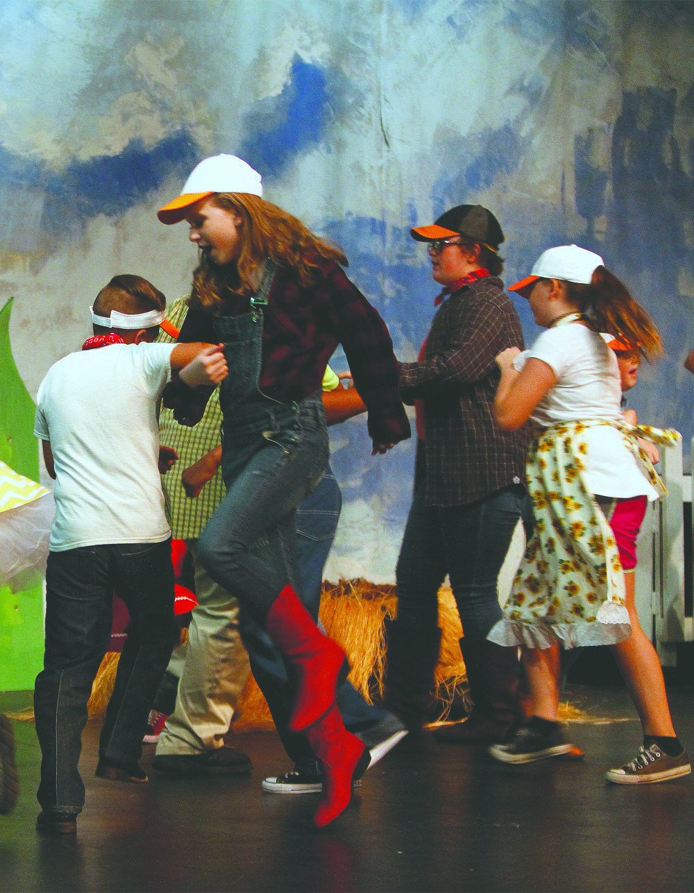 Honk Jr. dances on stage