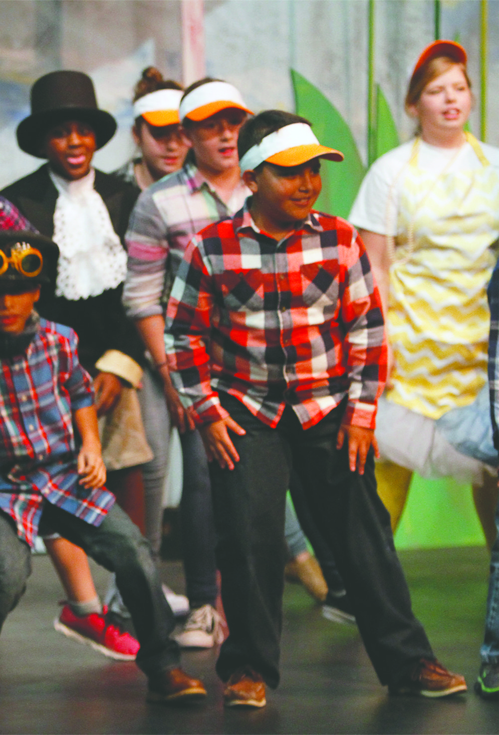 Honk Jr. dances on stage